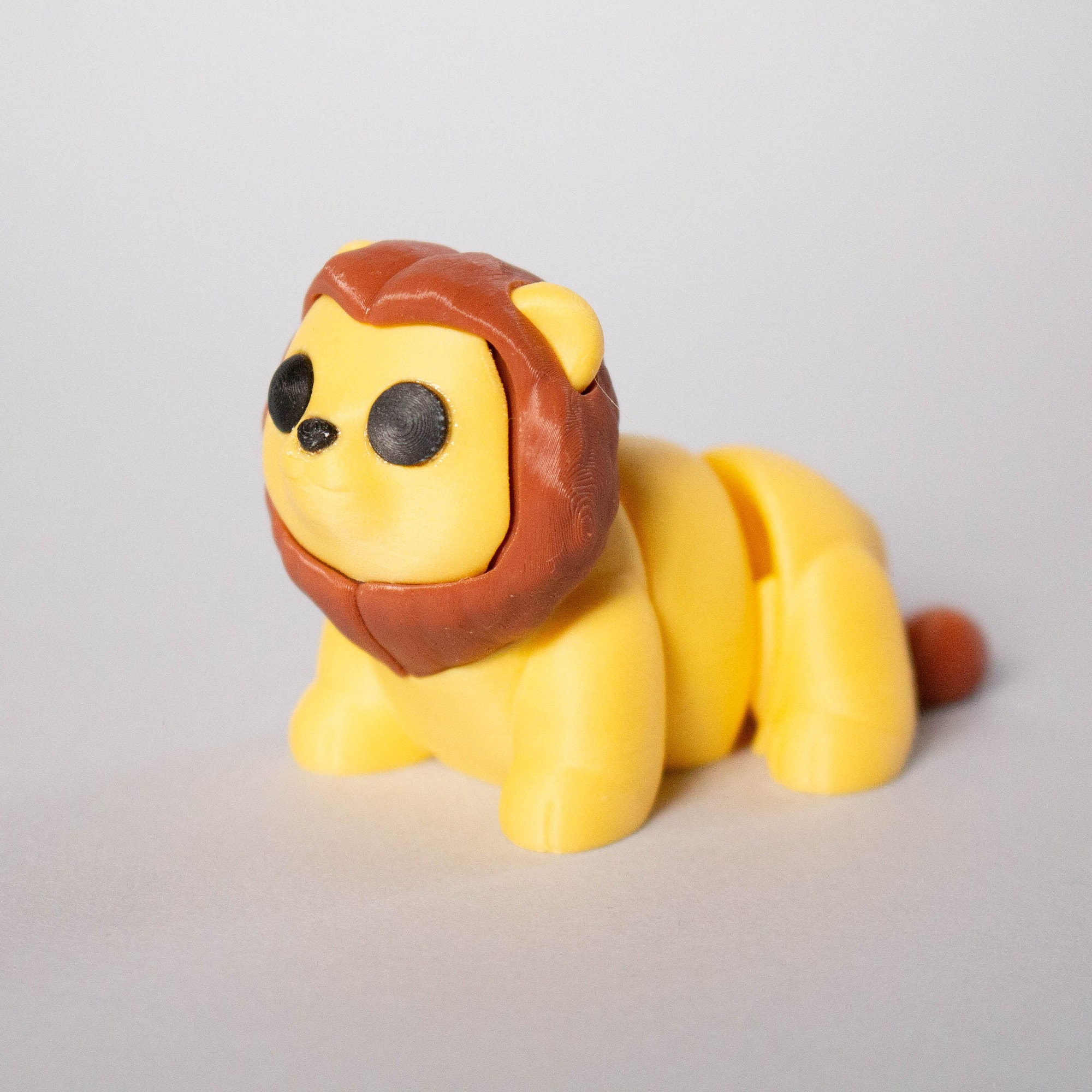 Tiny Lion Articulated 3D Print Designed by ZOU3D - Etsy