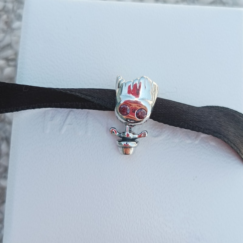 Marvels Charm - Etsy