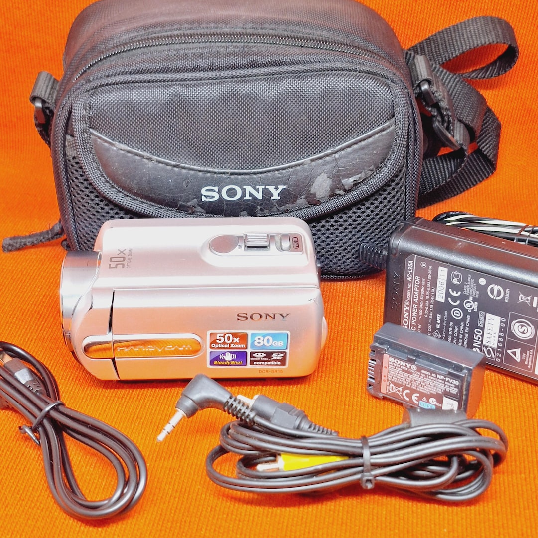 Sony DCRSR15 Handycam Camcorder - Silver (50x Optical Zoom, 0.8 MP, 2.7 ...