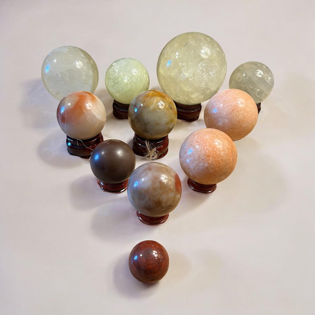 Collection of Polished Mineral Spheres on Stands; Jasper, Calcite ...
