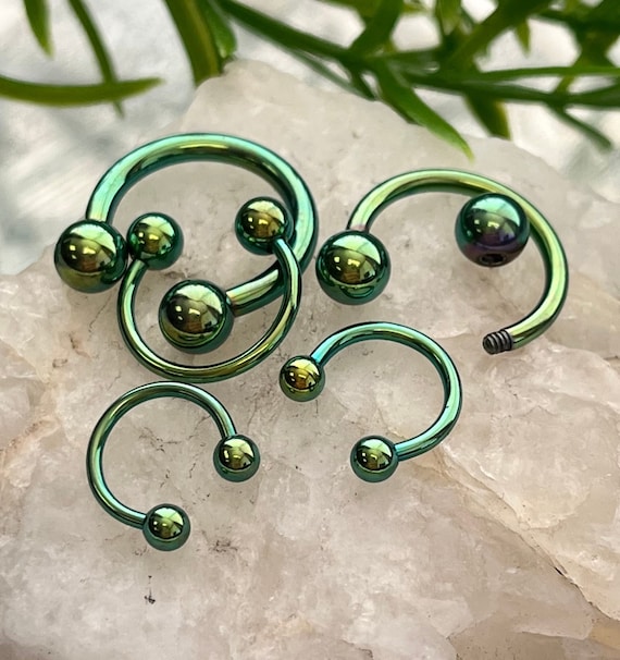 Titanium horseshoe ring store