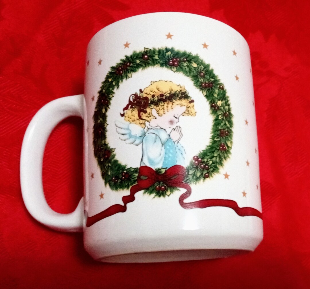 4 Praying Angel Mugs. With A Wreath and Red Bow Surrounded by Gold ...