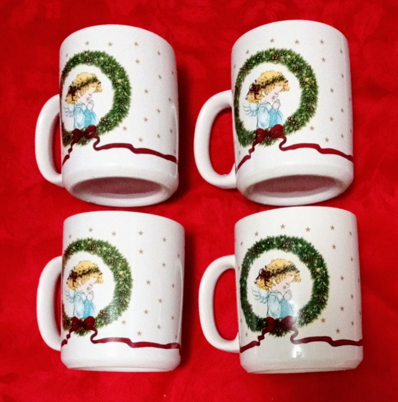 4 Praying Angel Mugs. With A Wreath and Red Bow Sourounded by - Etsy