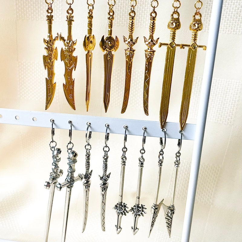 Weapon Earrings - Etsy