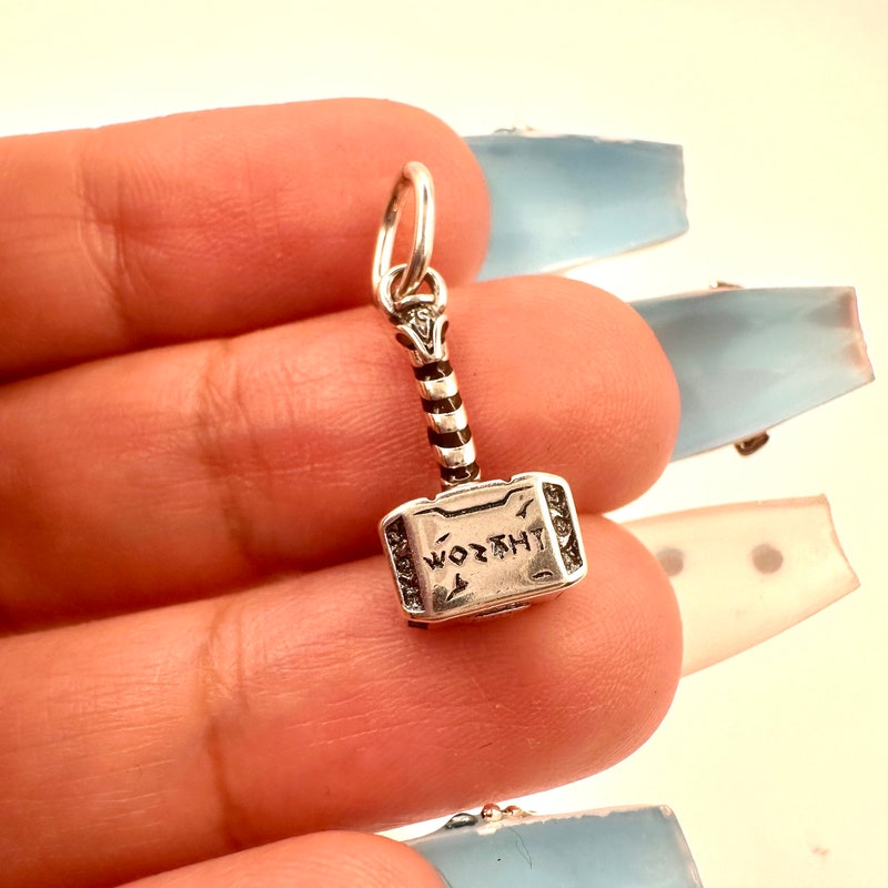 Marvels Charm - Etsy