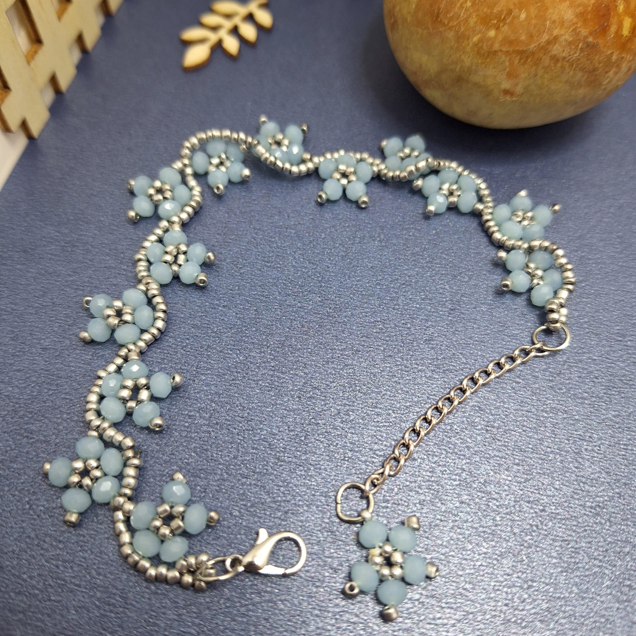 Beautiful Handmade Bracelet Features a Stunning Spiral Design With Cyan ...