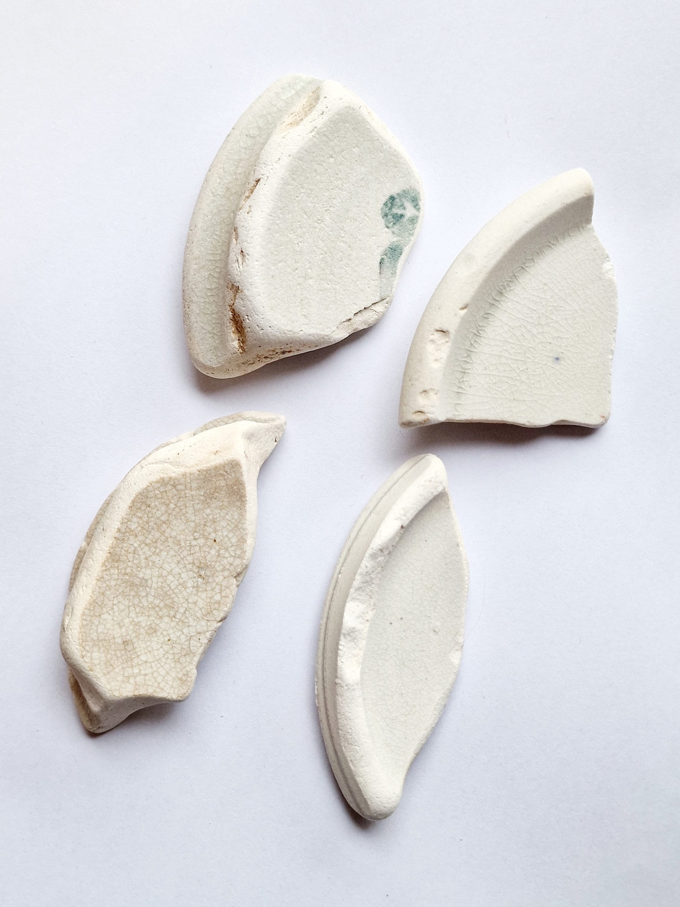 A Selection of 4 Beige Curved Pottery Pieces Broken Edges Plates Cups ...