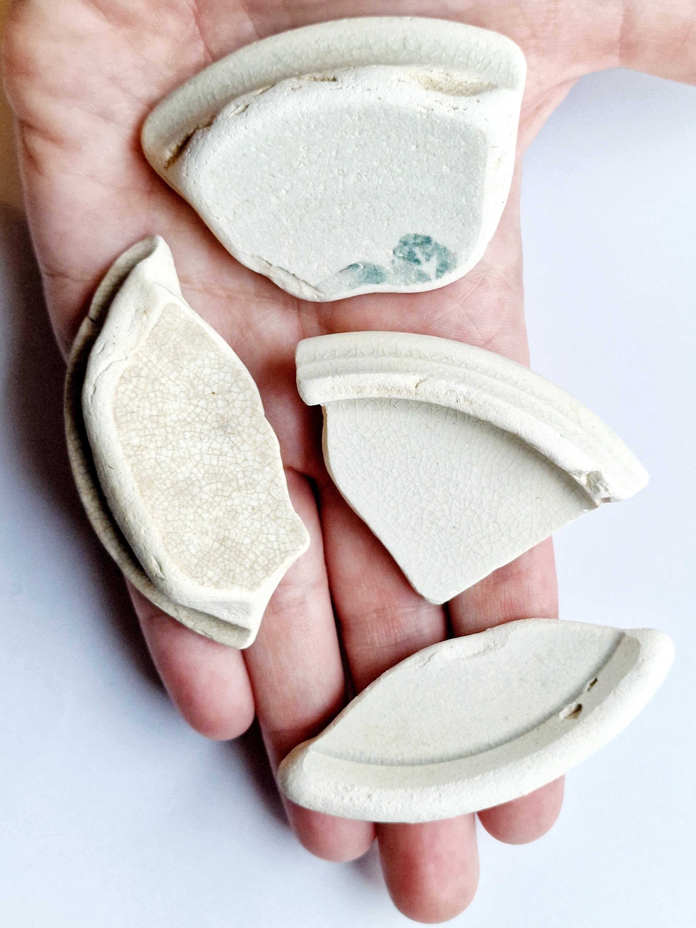 A Selection of 4 Beige Curved Pottery Pieces Broken Edges Plates Cups ...