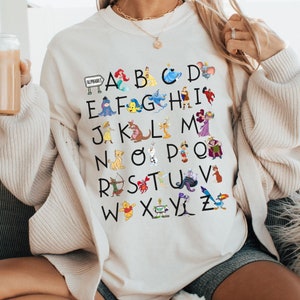 Characters Alphabet Teacher Comfort Colors Shirt, Kindergarten Teacher ...