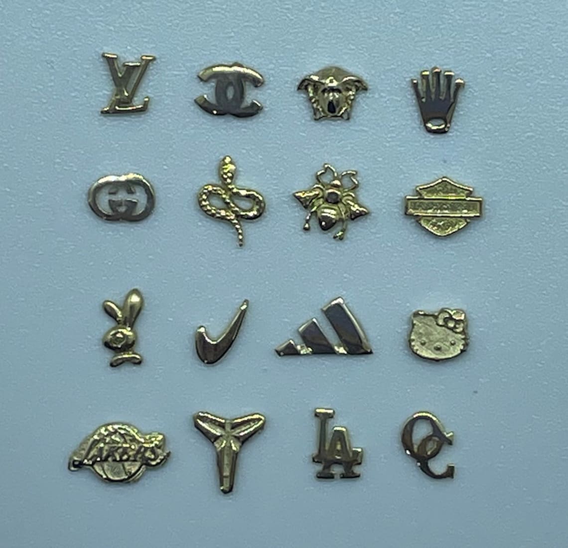 18k Gold LOGO Tooth Gems - Etsy