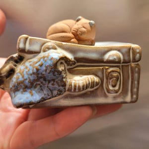 Rosenthal Netter Art Pottery Cat Sleeping on Suitcase Red Clay and ...