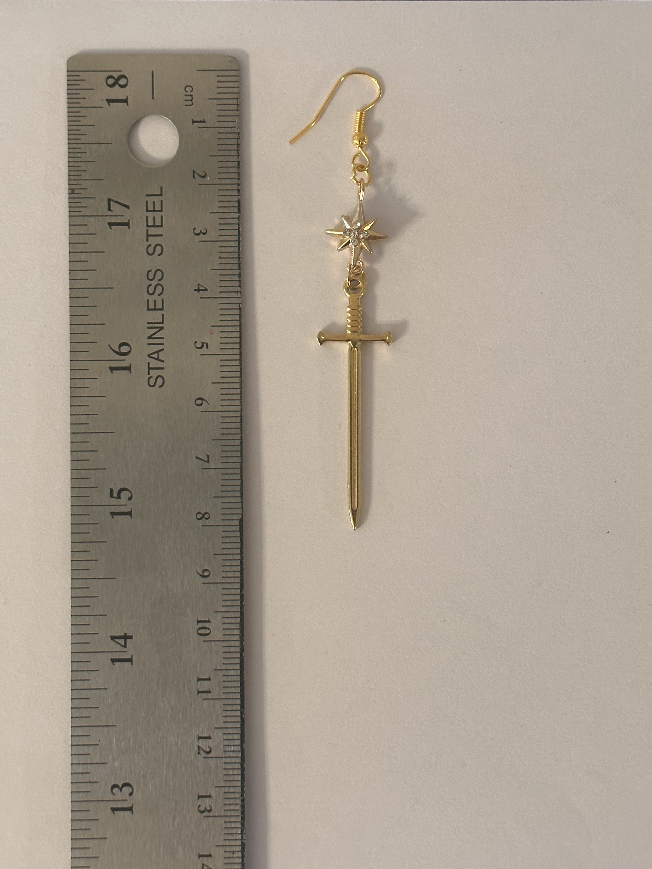 Gold Star & Sword Dangle Earrings - Etsy