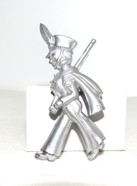 WWII Era Plastic Marching Soldier Pin - Gem