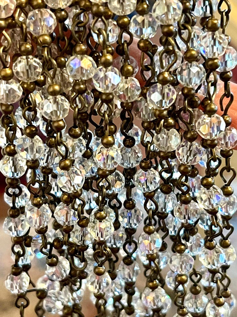 7.6mm X 6mm, Crystal Glass and Brass Bead, Bead Chain. It is Sold by ...