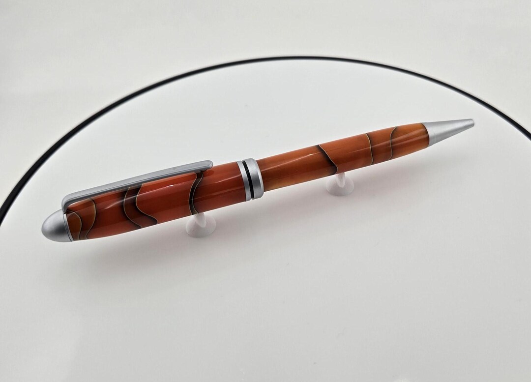 Unleash Your Creativity With Our Custom Orange & Black Swirl Twist ...