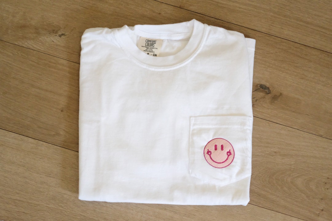 Embroidered MIDDLE FINGER SMILEY Pocket T-shirt | Comfort Colors ...