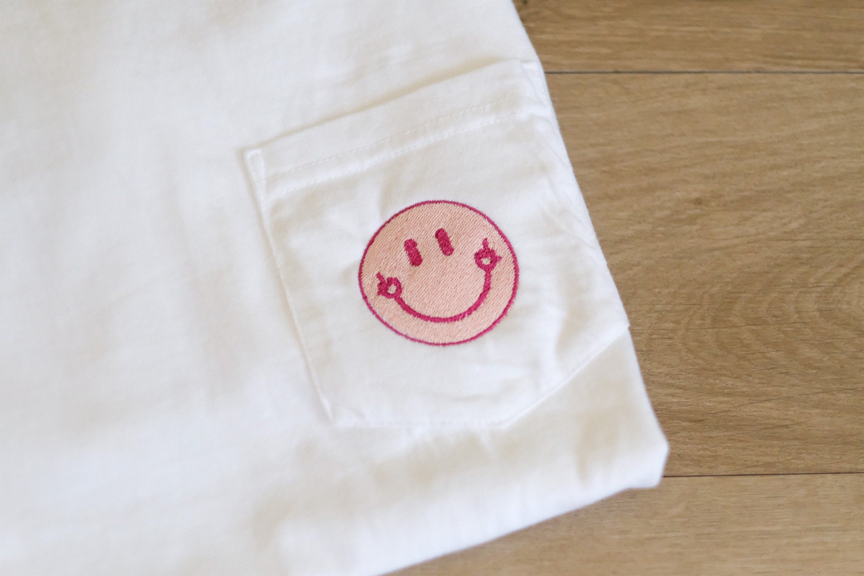 Embroidered MIDDLE FINGER SMILEY Pocket T-shirt | Comfort Colors ...