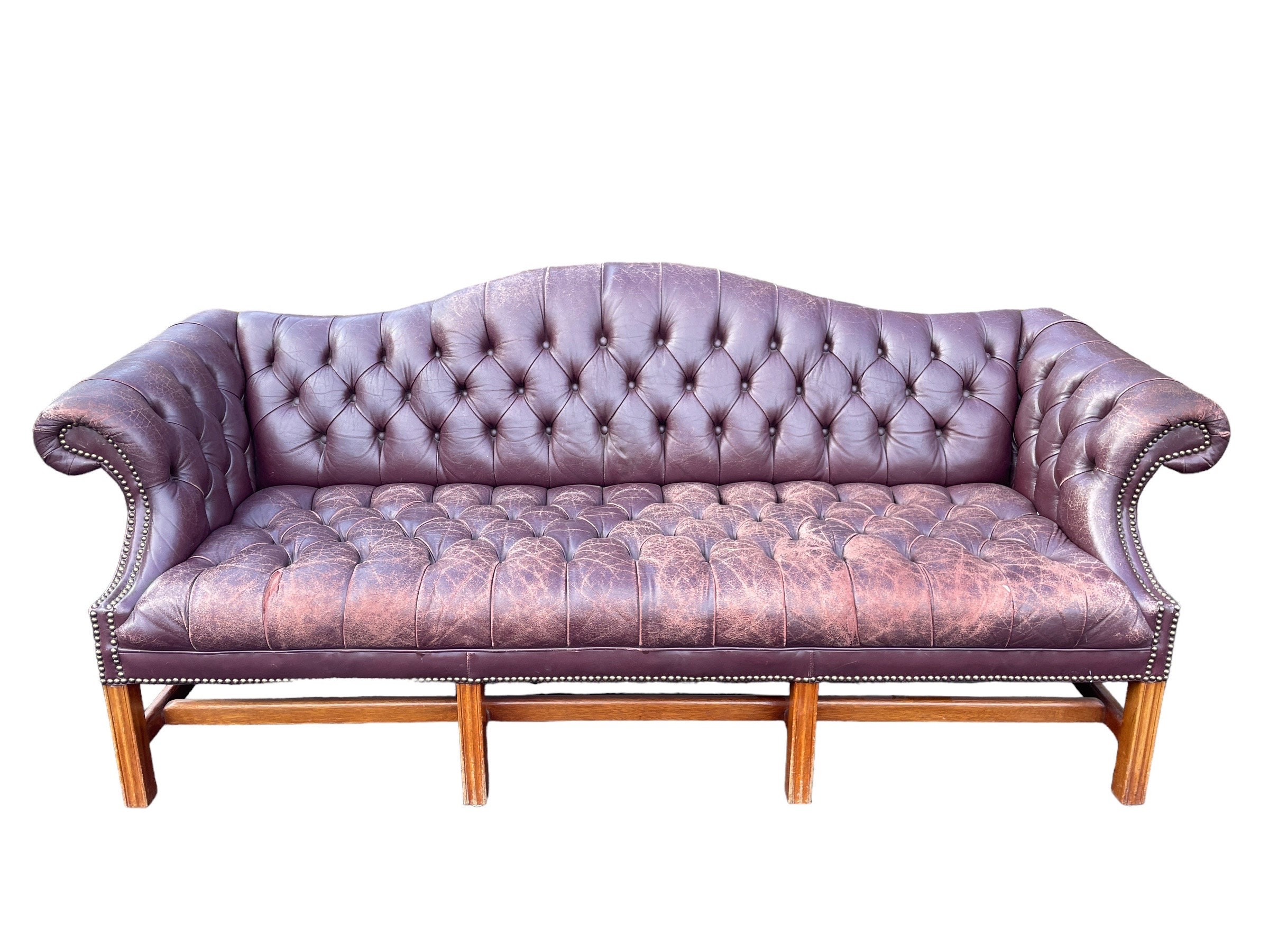 Tufted camelback sofa store