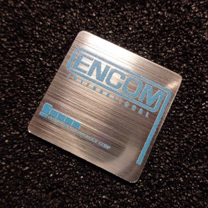 Encom International Corporation Logo Label Decal Case Sticker Badge 473 ...