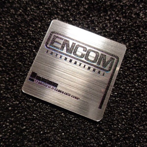 Encom International Corporation Logo Label Decal Case Sticker Badge ...