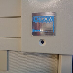 Encom International Corporation Logo Label Decal Case Sticker Badge 473 ...