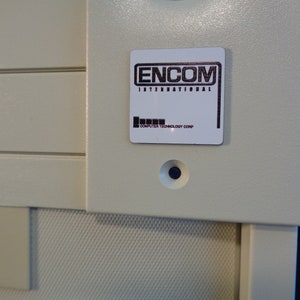 Encom International Corporation Logo Label Decal Case Sticker Badge ...