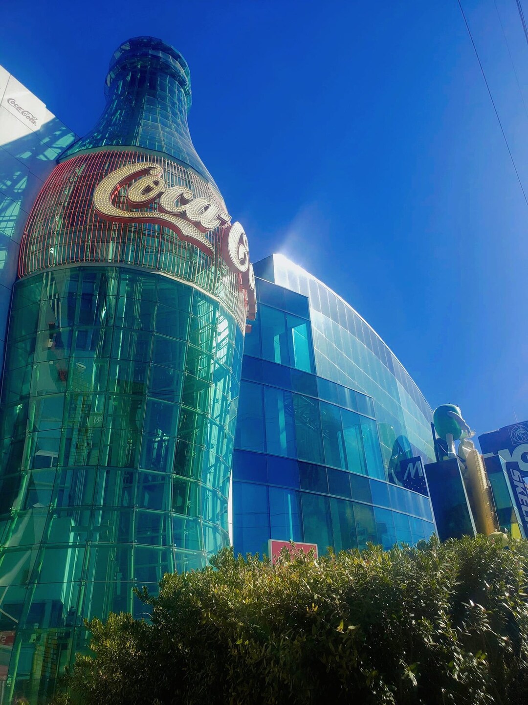 Photos of the Coca - Cola Store's Giant Coke Bottle Structure in Vegas ...