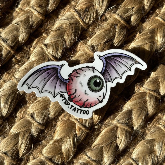 Flying Eyeball Tattoo Designs