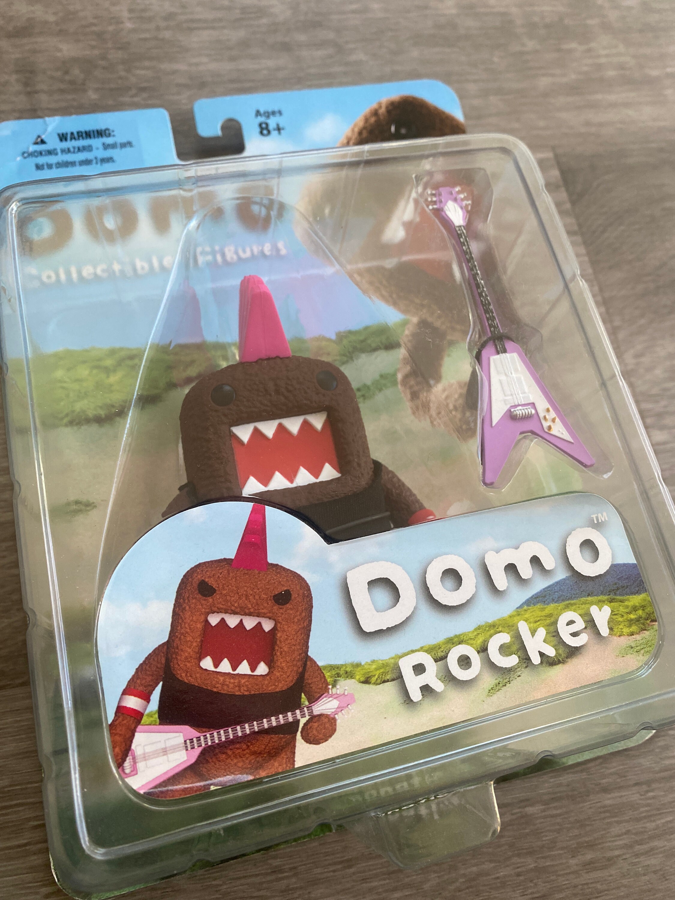 Domo Rocker Figurine - Etsy