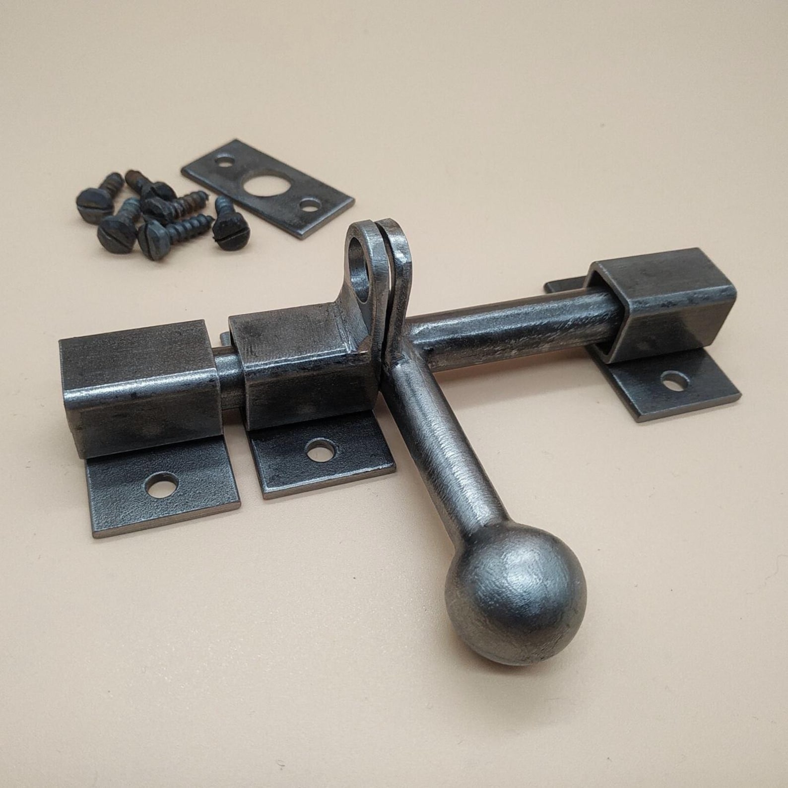 A Door Latch, Handcrafted in a Rustic Style, Ensures Reliable and Easy ...