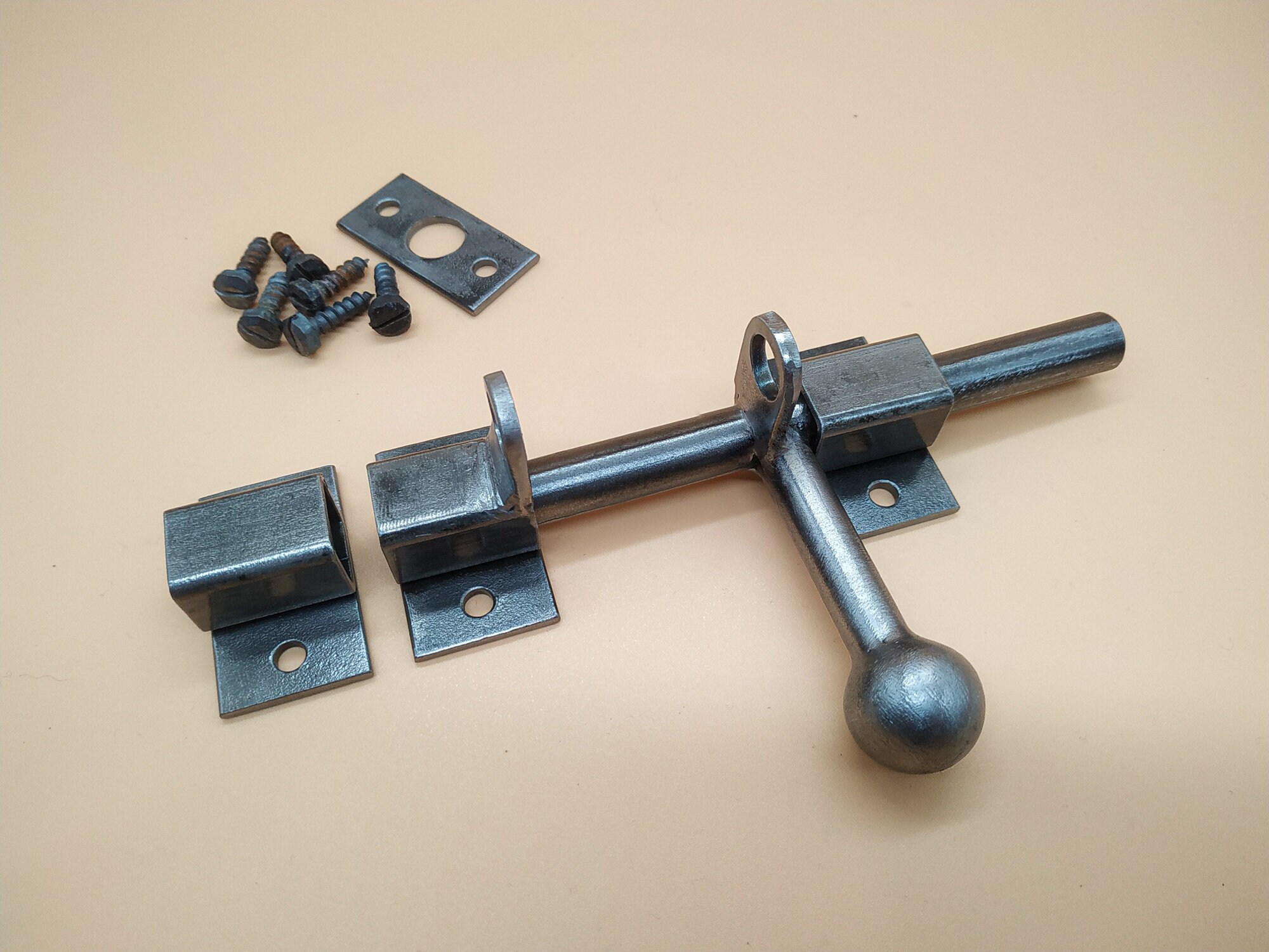 A Door Latch, Handcrafted in a Rustic Style, Ensures Reliable and Easy ...