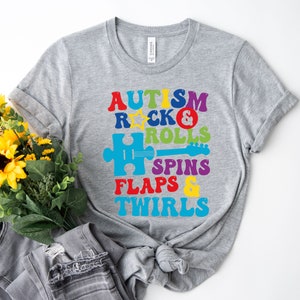 Autism Rocks and Rolls and Spins and Flaps and Twirls Shirt, Funny ...