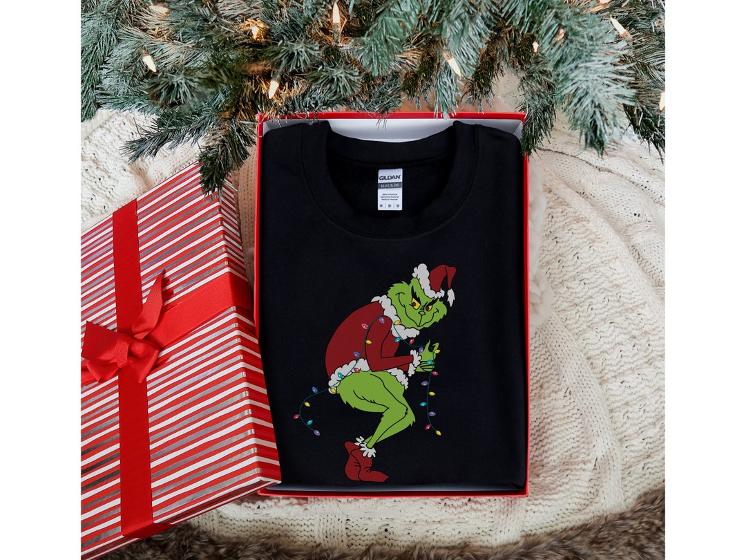 The Grinch Stealing Christmas Lights Sweatshirt, Grinch Lover's Gift ...