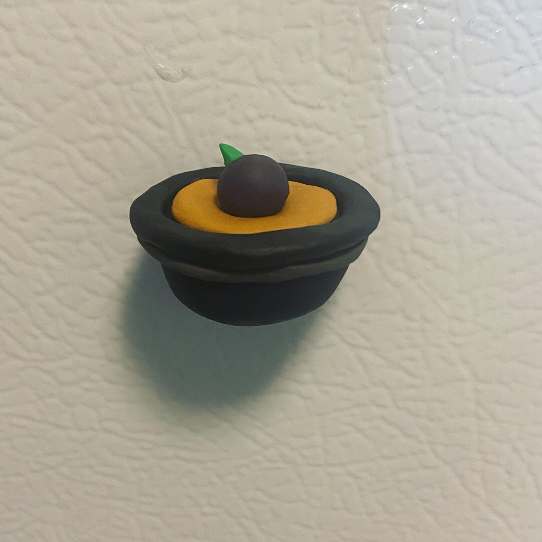 A Single Plum Floating in Perfume Served in A Man’s Hat Magnet - Etsy