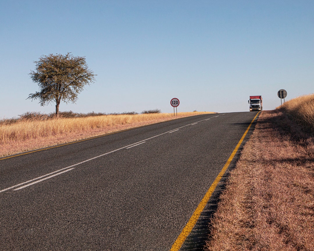 Namibia. Namibian Tarmac Road With a Lorry Approacjing From the Far ...