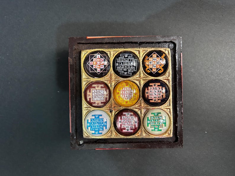Navagraha Crystal Yantra on Wooden Chowki | Nine Planet Healing Stone ...