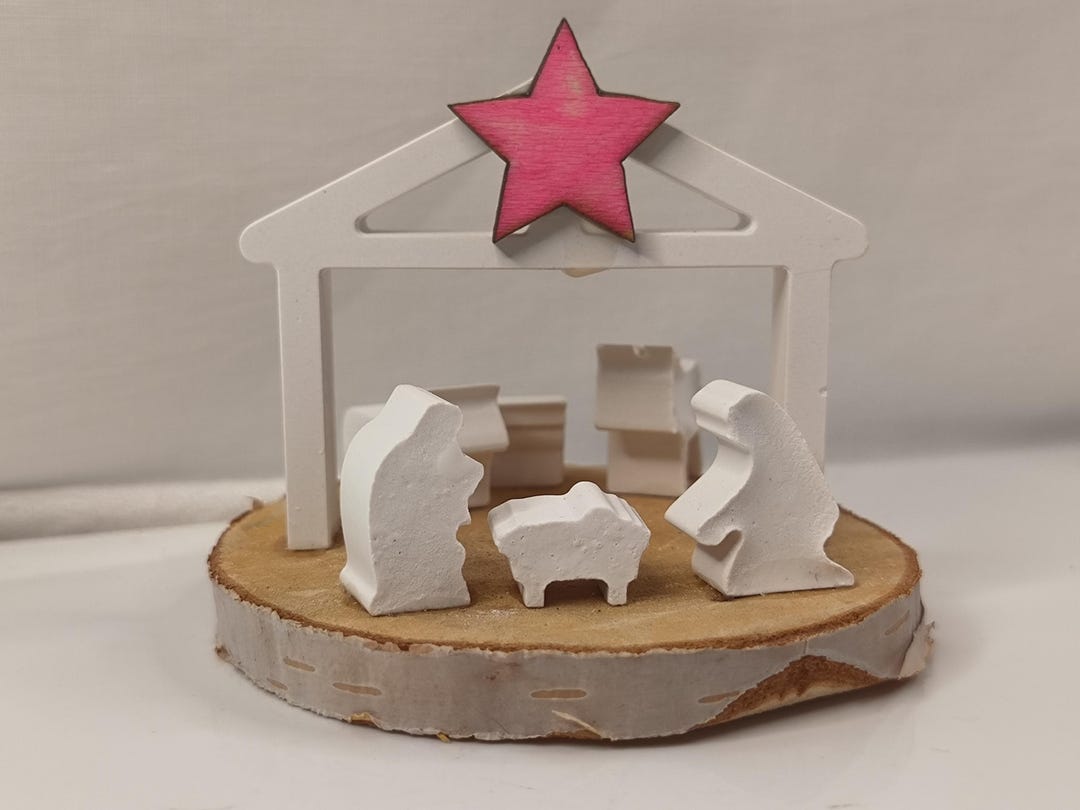 White Wooden Crib on a Tree Disc With Pink Star Desk Crib Christ Birth ...