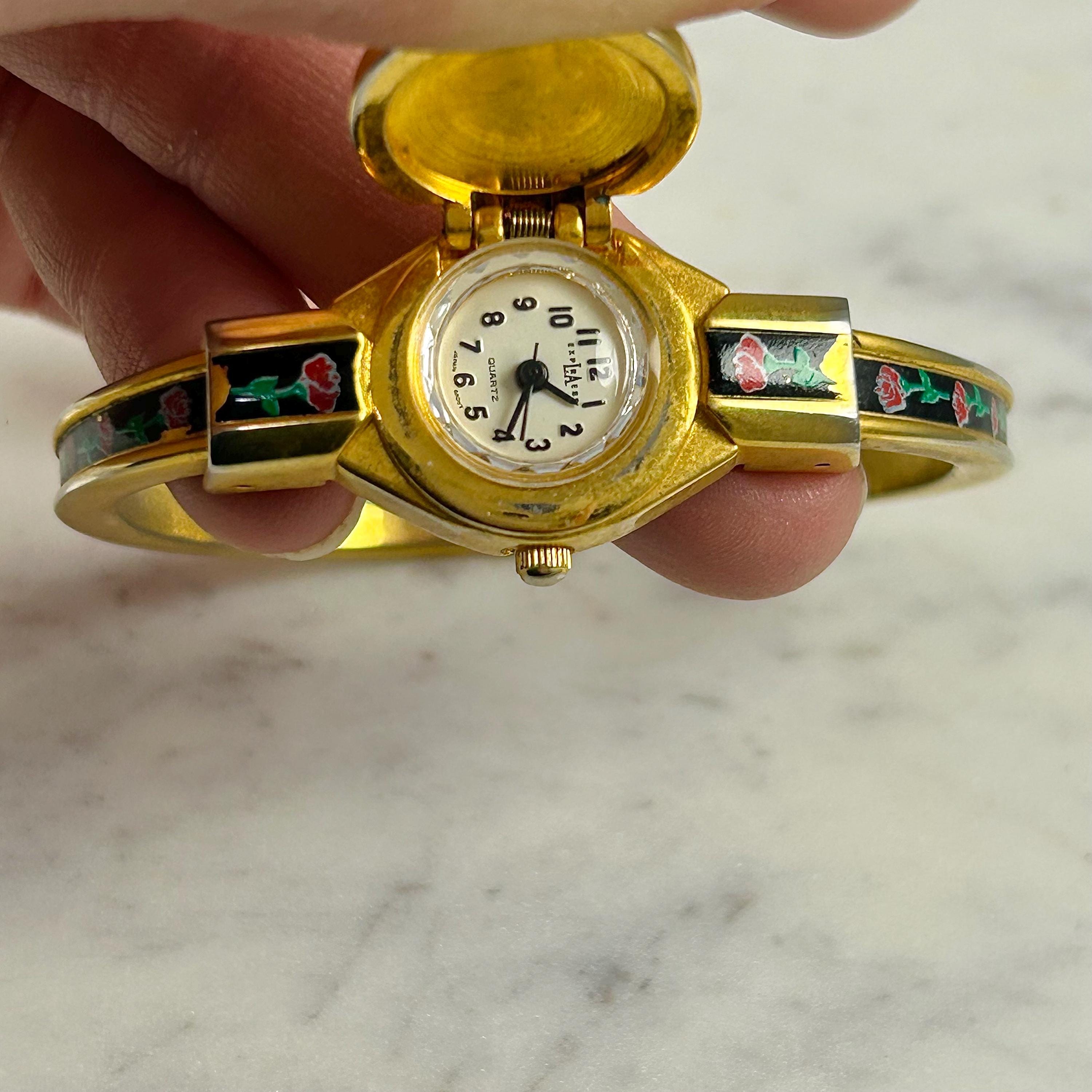 Gold Tone Peek-a-boo Vintage Womens Watch, Black With Flower Detailing ...