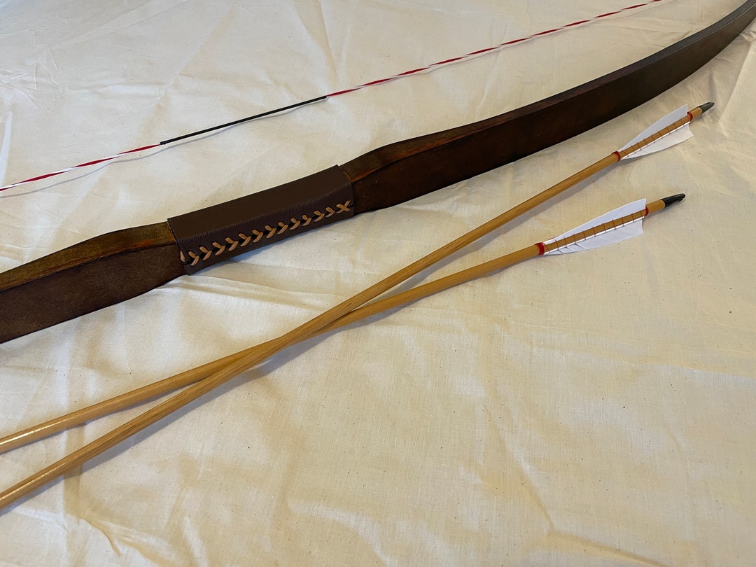 Longbow. 100% Handcrafted. 68 Inch Maple. Features Rawhide Backing ...