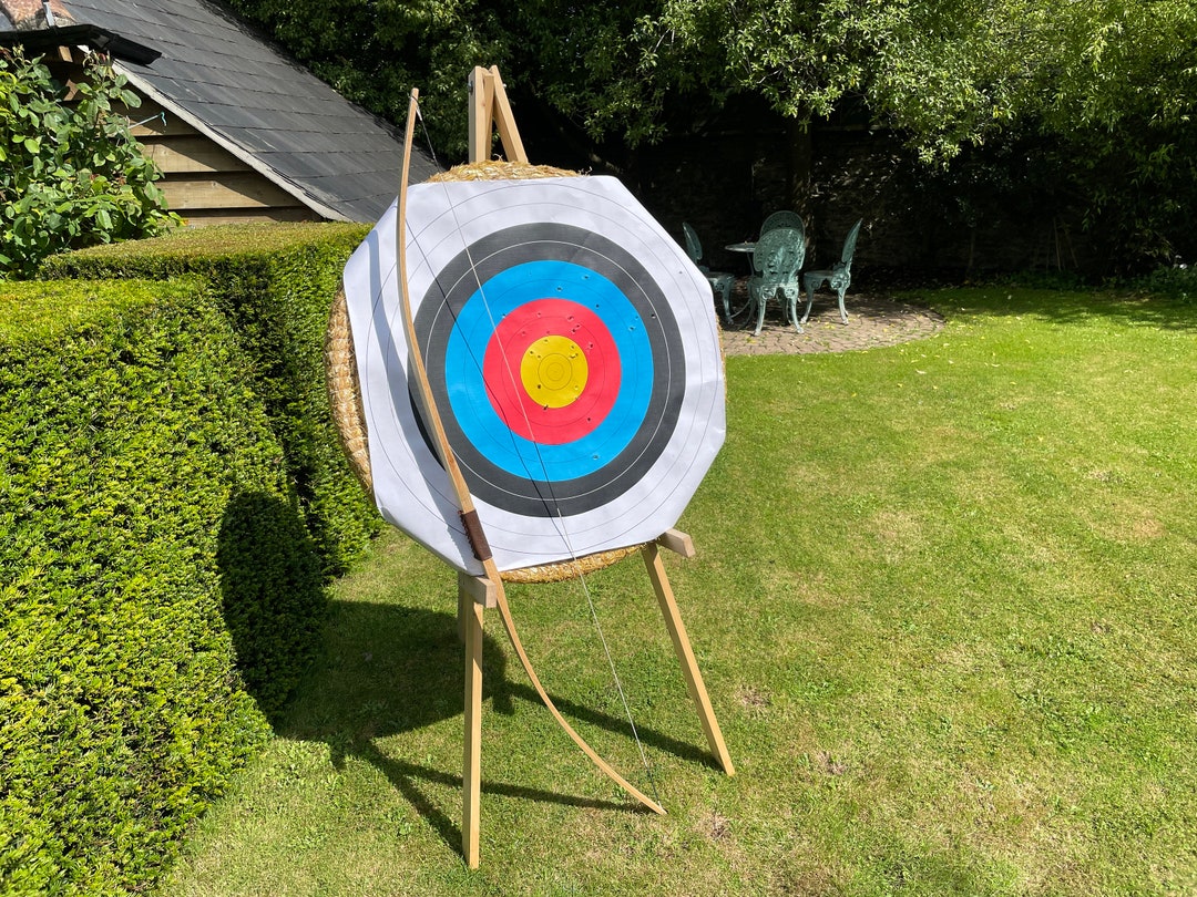 Longbow. 100% Handcrafted. 70 Inch Red Oak. Features Rawhide Backing ...