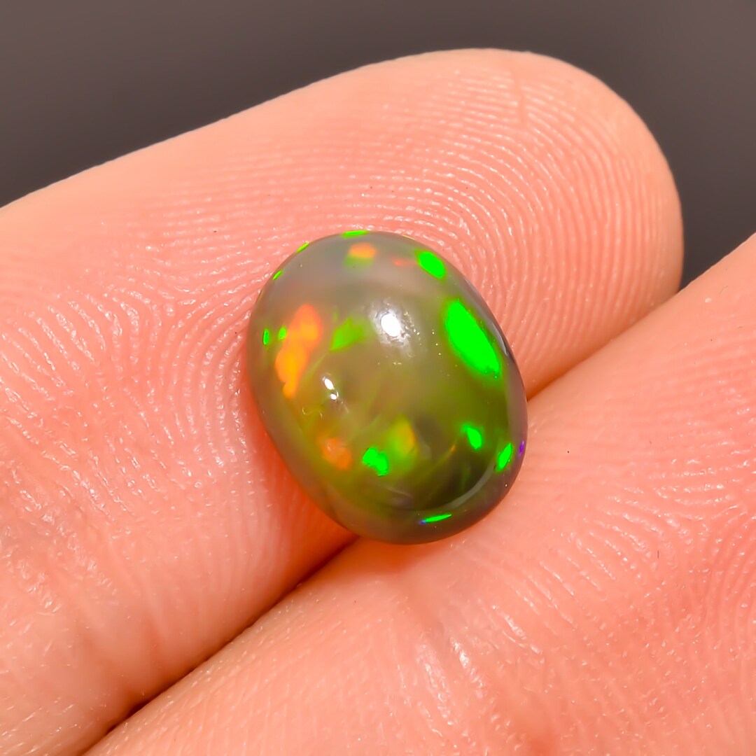 1.5 Ct AAA Quality Black Ethiopian Opal Oval Shape Cabs Fire Play Opal ...