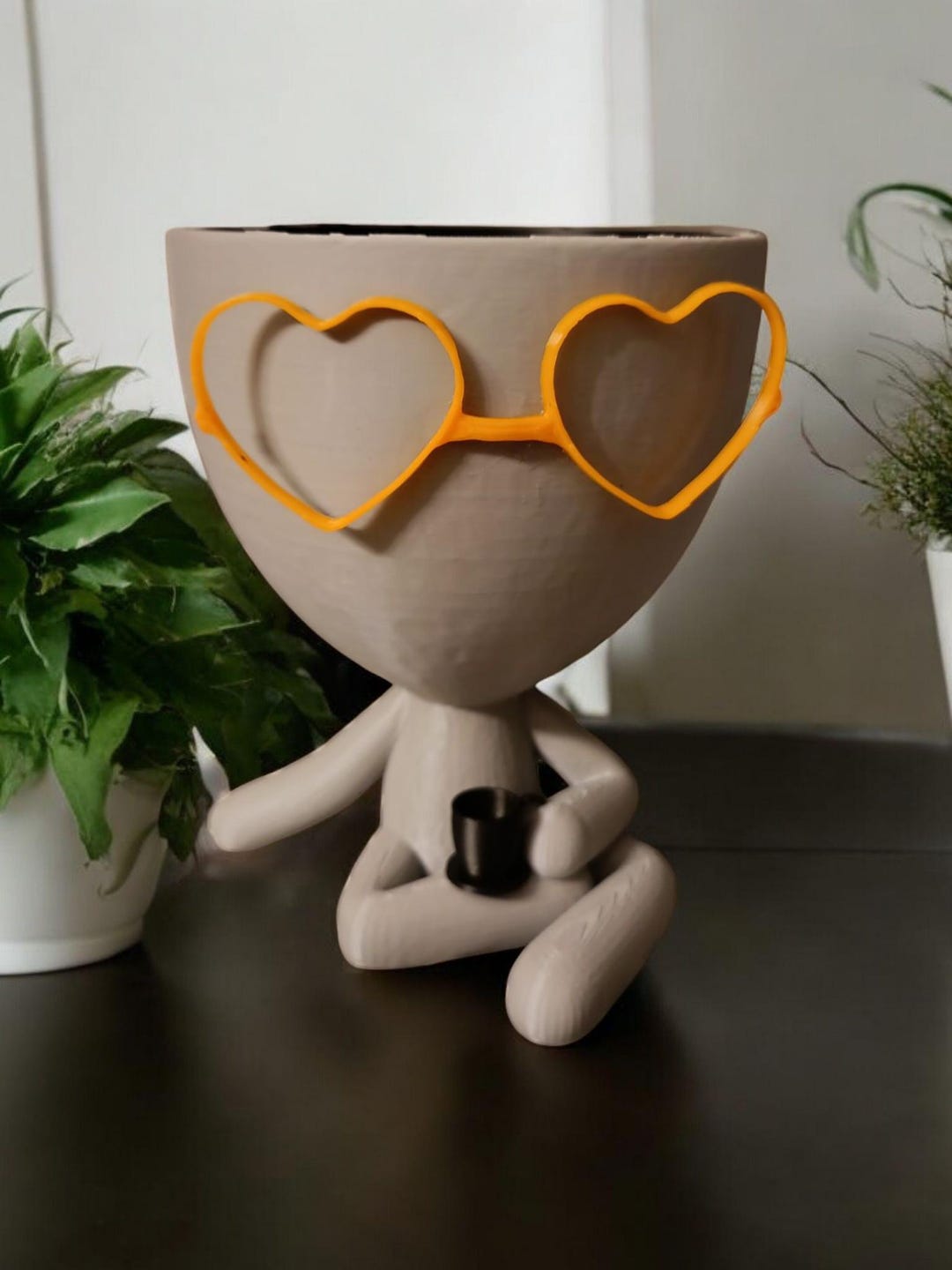 Robert Planter People Planter Holding Coffe Mug Self Watering Planter ...