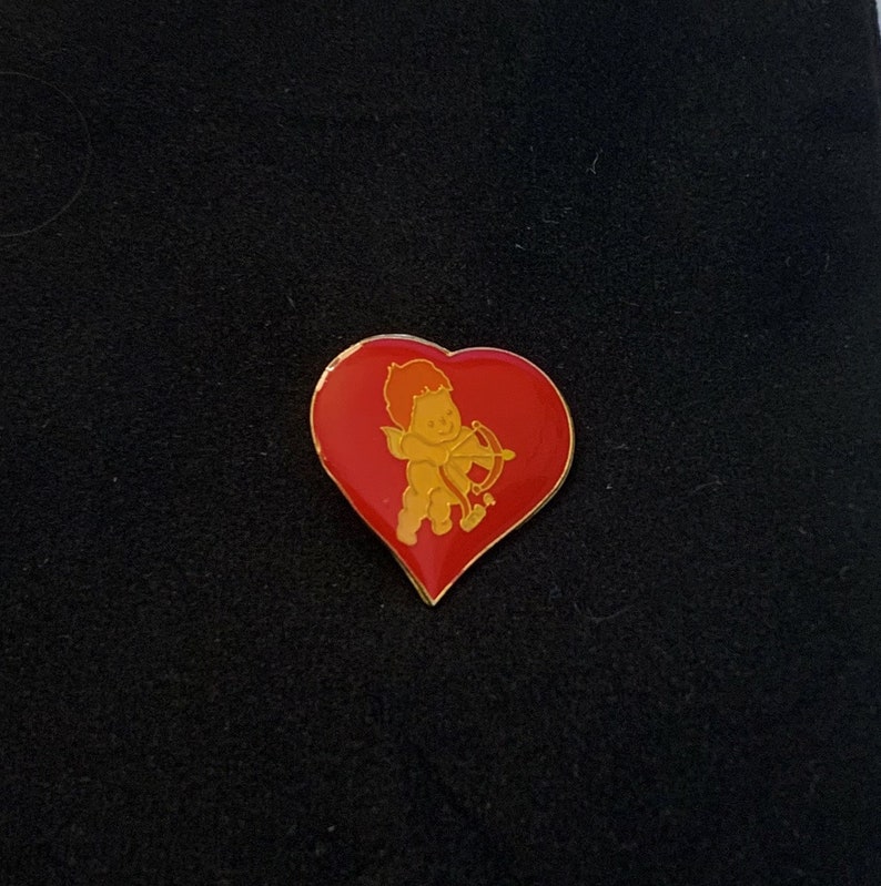 Enamel Red Heart Shped Pin With Design of Cupid and a Bow Gold Tone Rim ...