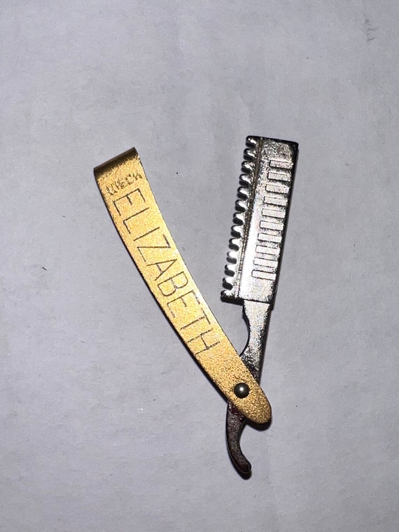 Vintage razor lapel pin - Gem