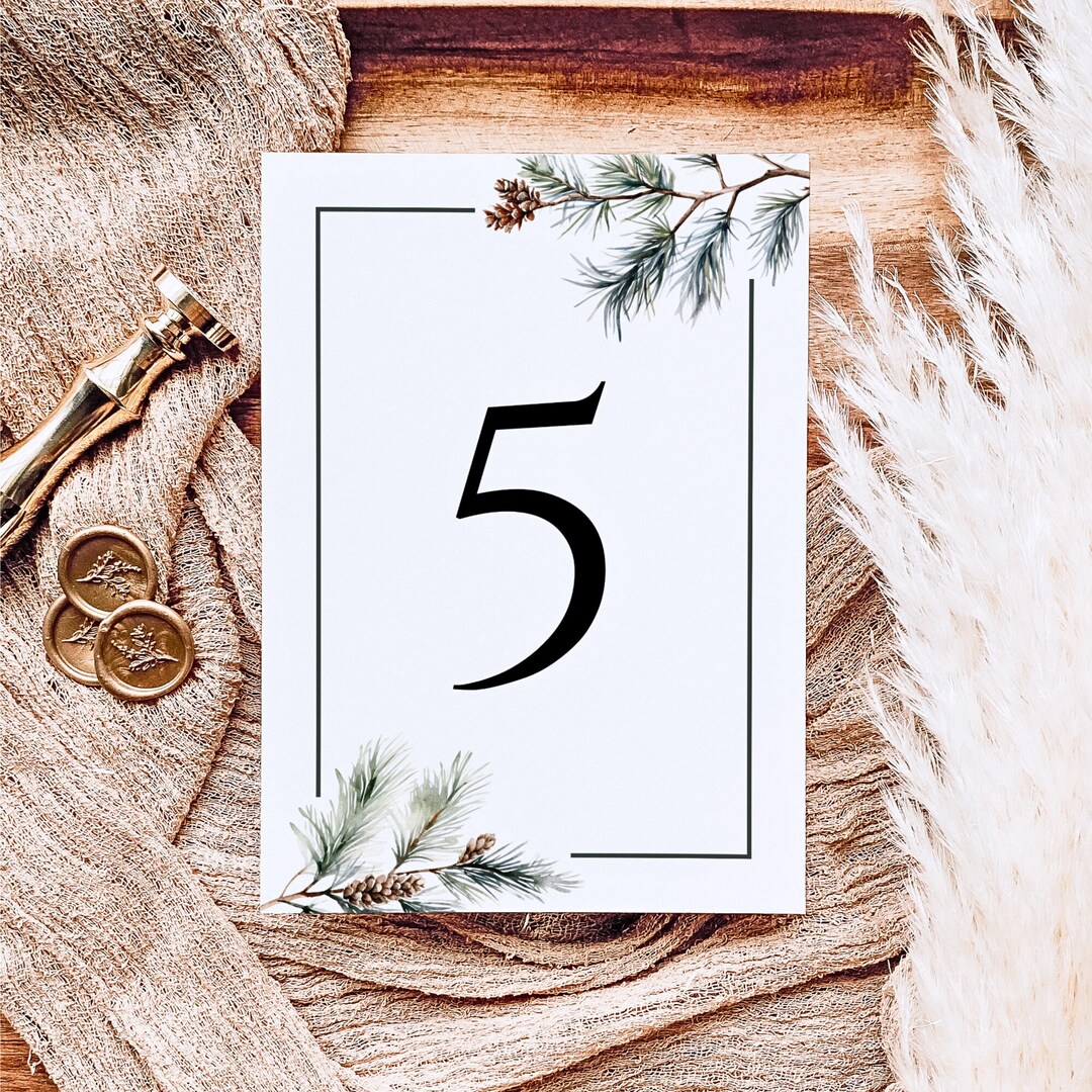 Minimal Winter Wedding Table Number Signs With Border and Pine Cones ...