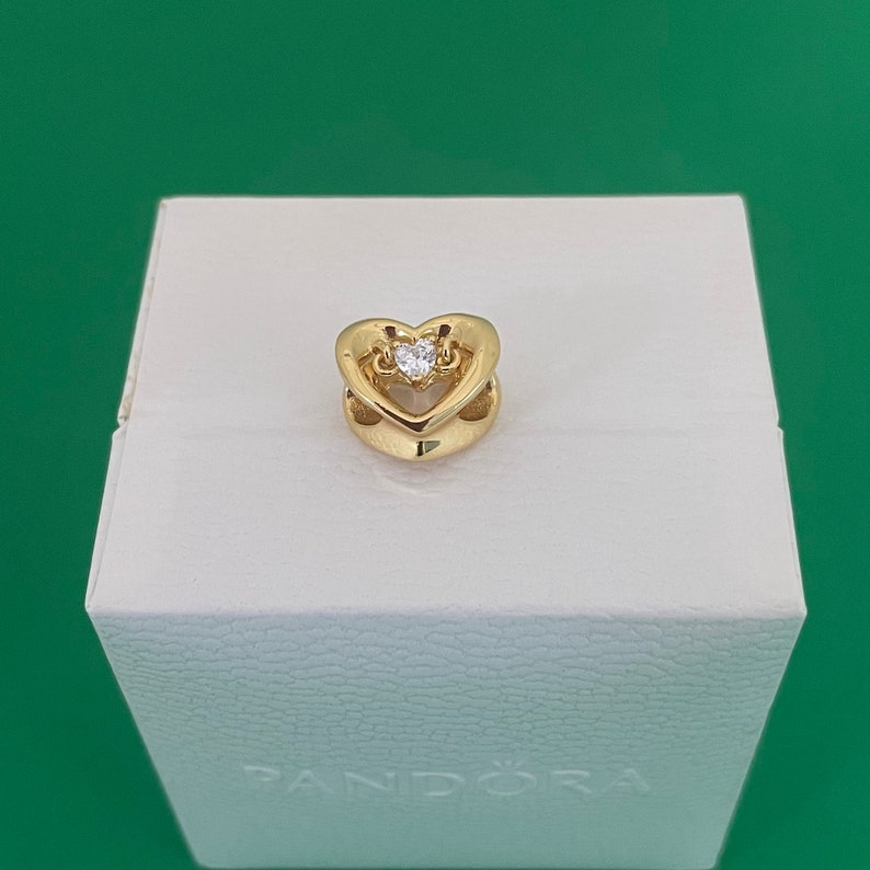 Pandora Radiant Heart & Floating Stone Charm Power of Love Gold 925 ... Pandora Radiant Heart & Floating Stone Charm Power of Love Gold 925 ...
