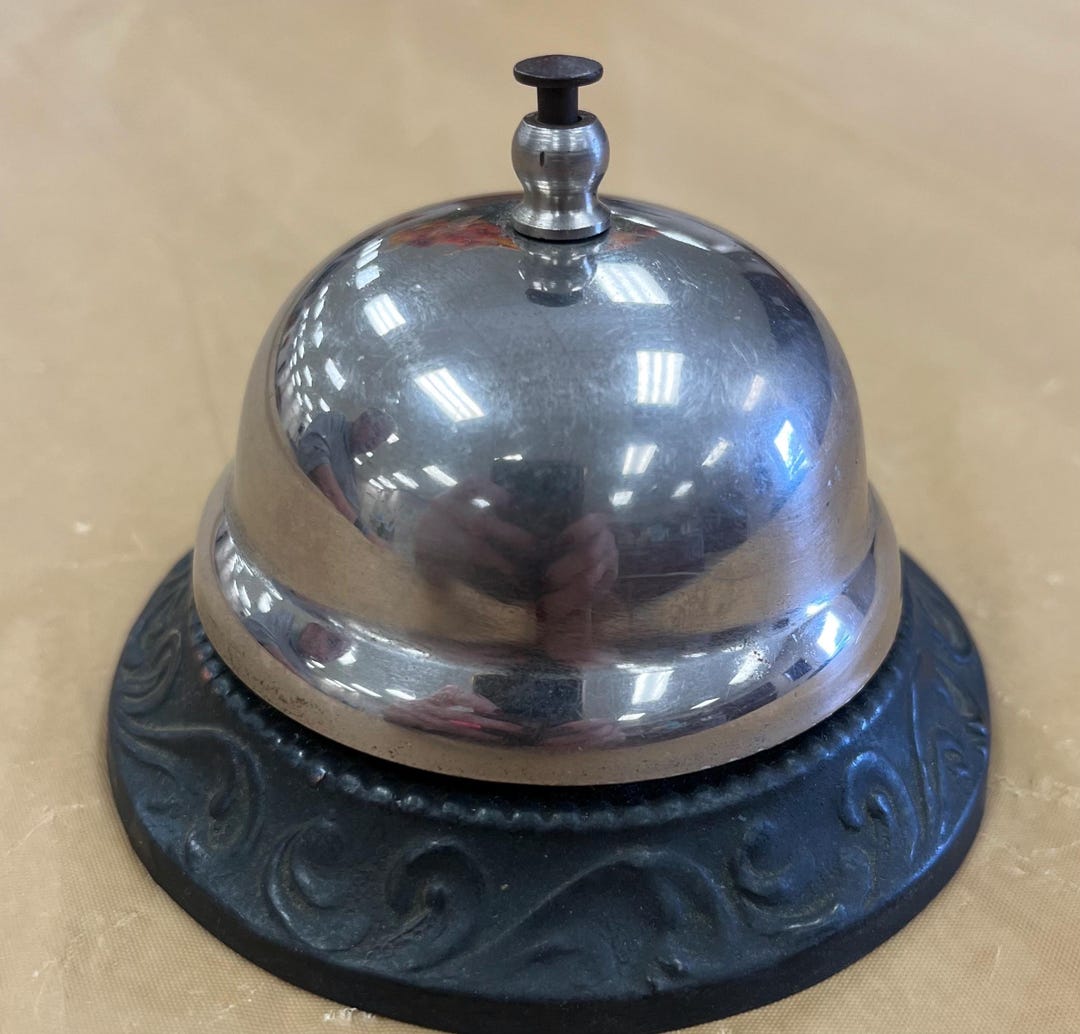 Vintage Front DESK or HOTEL BELL. Patinated. the Base of the Bell Has a ...