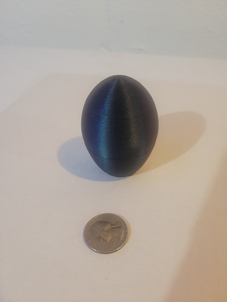 Middle Finger Egg - Burnt Titanium - Etsy