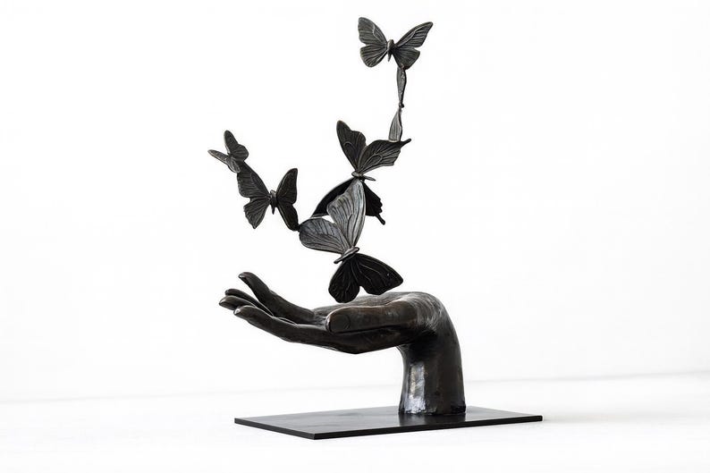 Magical Bronze Hand With Fluttering Butterflies – A Symbol of Eternal ...