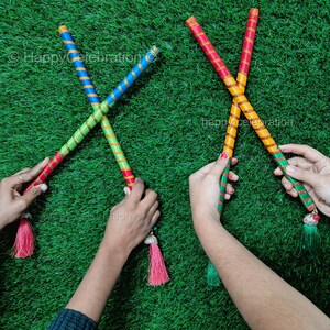 Gujarati Wooden Dandiya Sticks and Mehndi Decor for Vibrant Sangeet ...